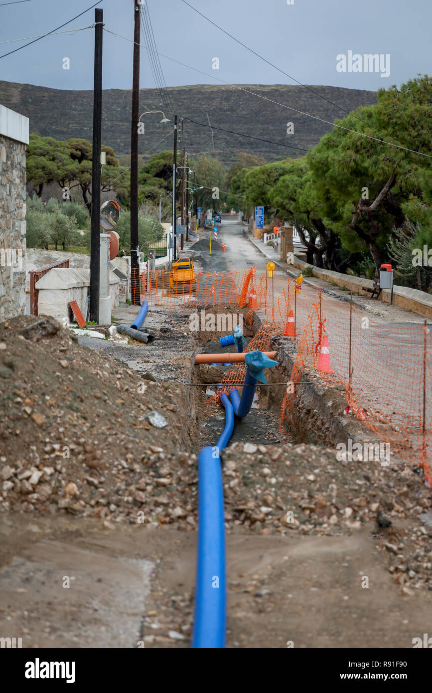 Road works with new blue water pipes. Stock Image Stock Photo - Alamy
