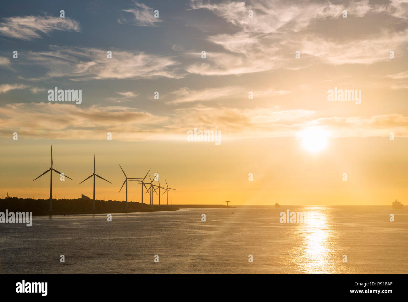 Offshore wind farm viewed from ferry leaving the Port of Rotterdam ...