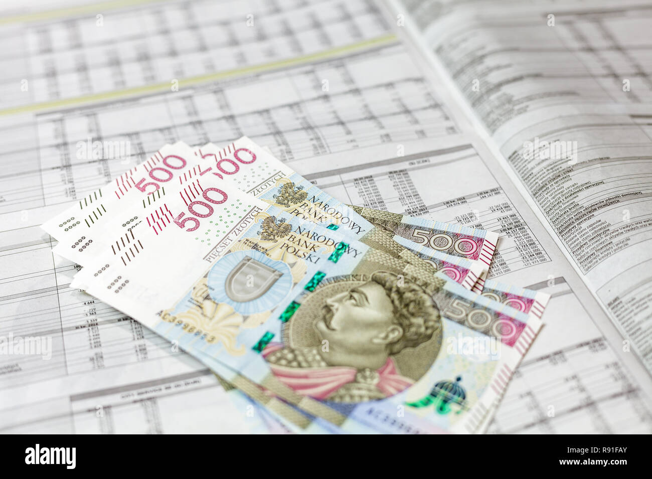 500 PLN banknotes on financial newspaper with companies report Stock ...