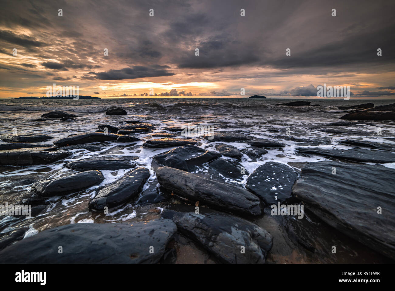 Rock beach Phuket Thailand Stock Photo - Alamy
