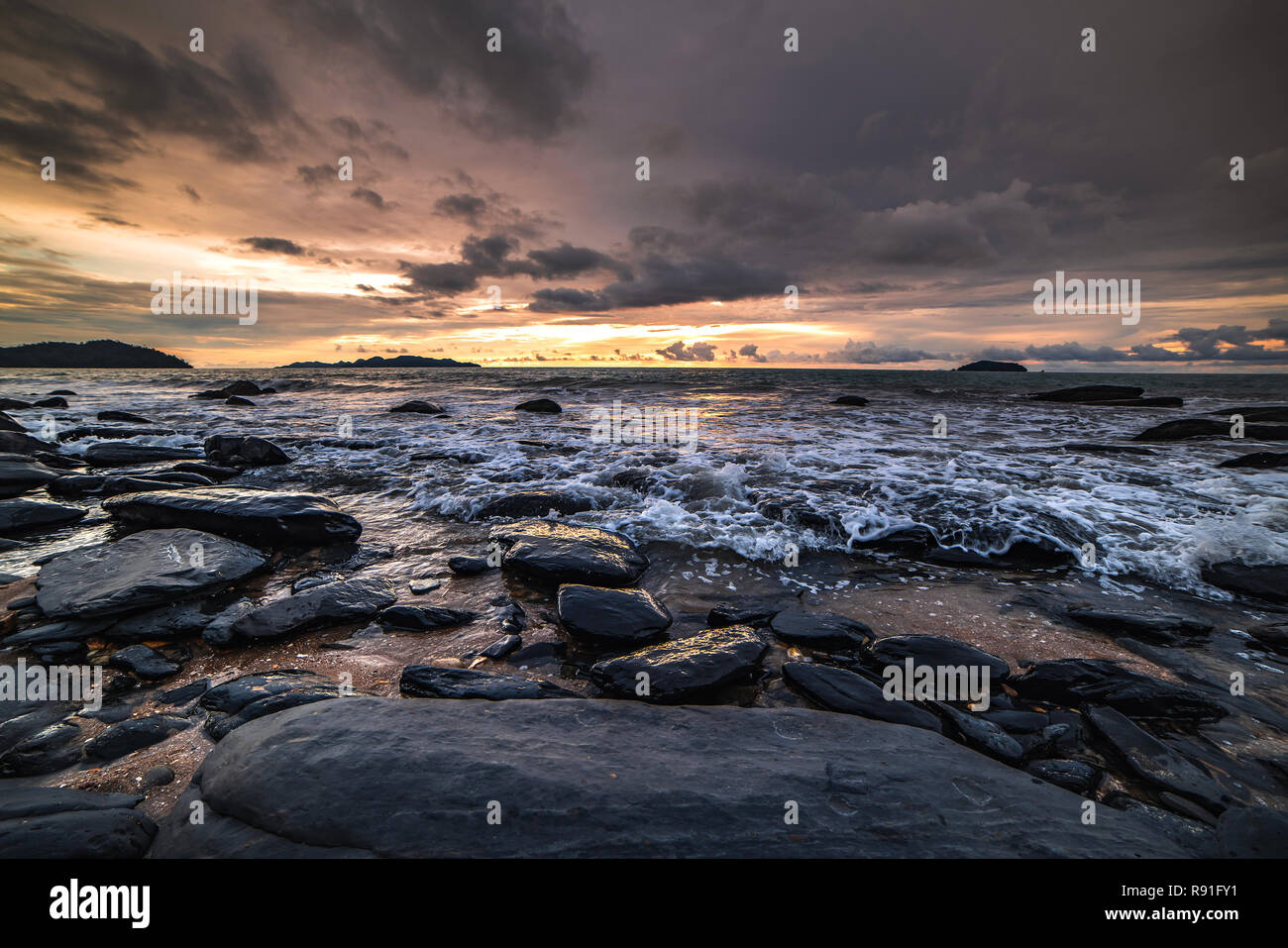 Rock beach Phuket Thailand Stock Photo - Alamy