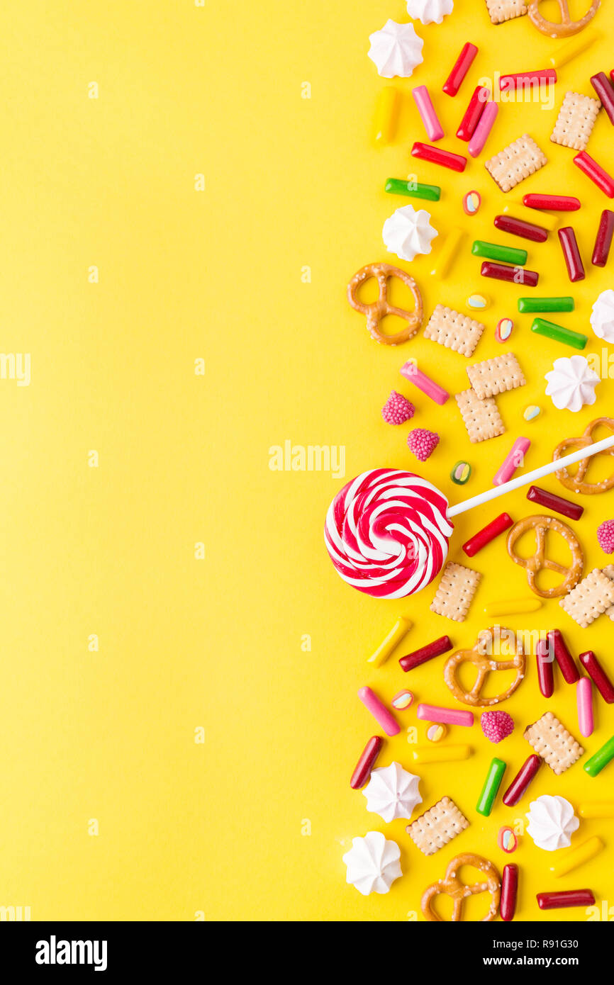 Flat Lay of Tasty Colorful Sweets on Yellow Background. Party Happy ...