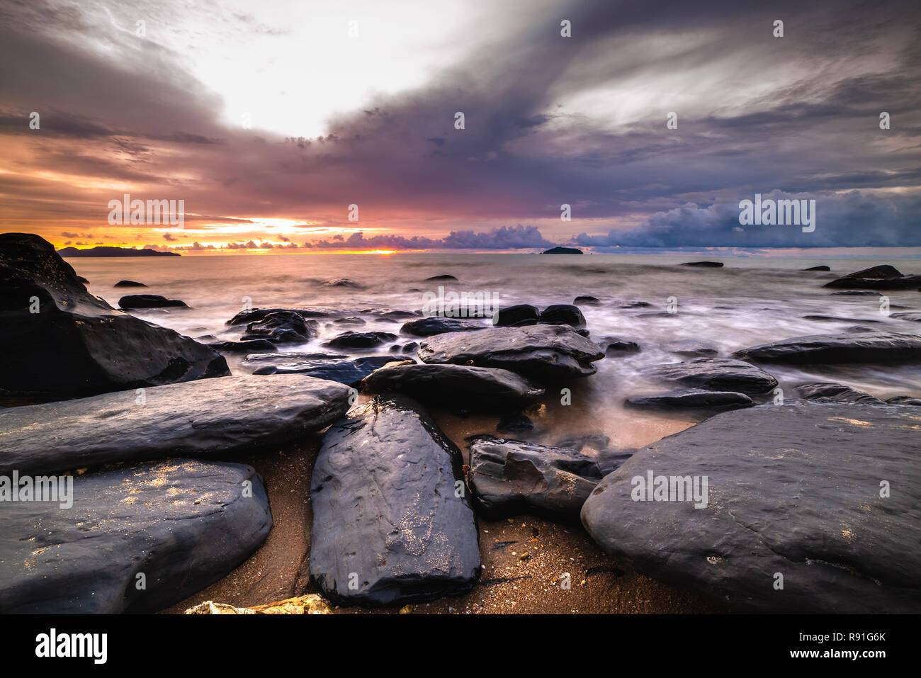 Rock beach Phuket Thailand Stock Photo - Alamy