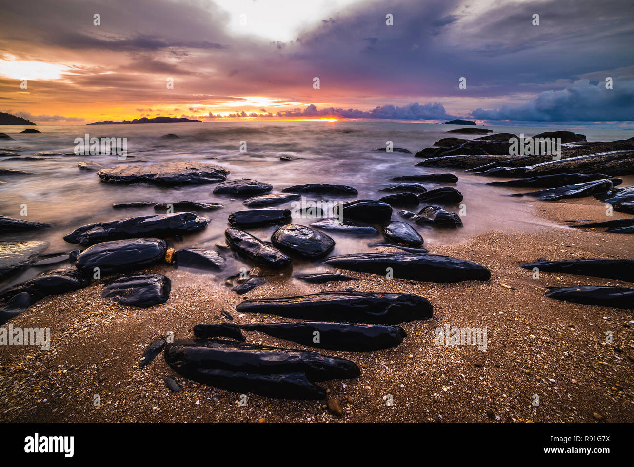 Rock beach Phuket Thailand Stock Photo - Alamy