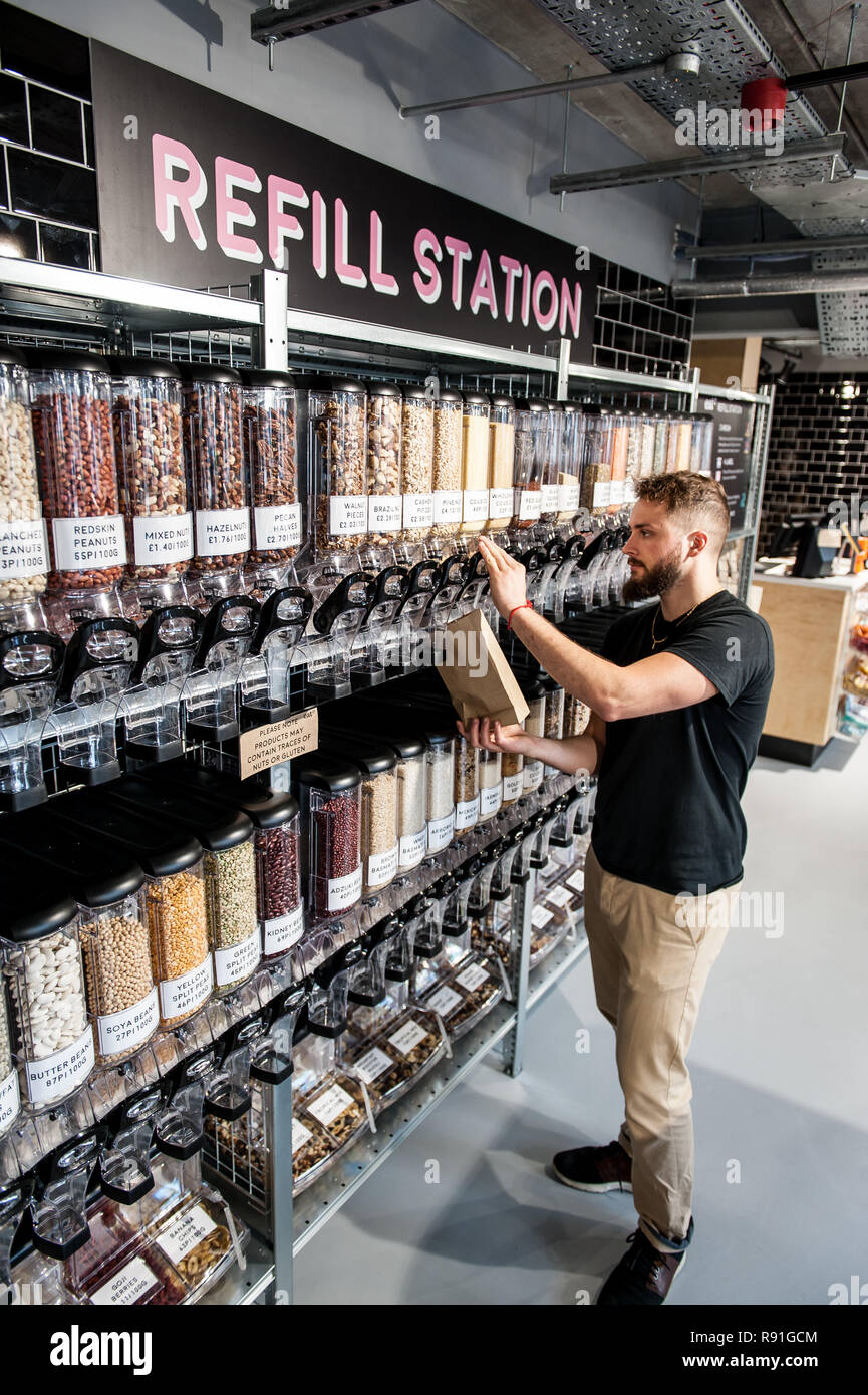 Selection of nuts and seeds at the refill station Stock Photo - Alamy