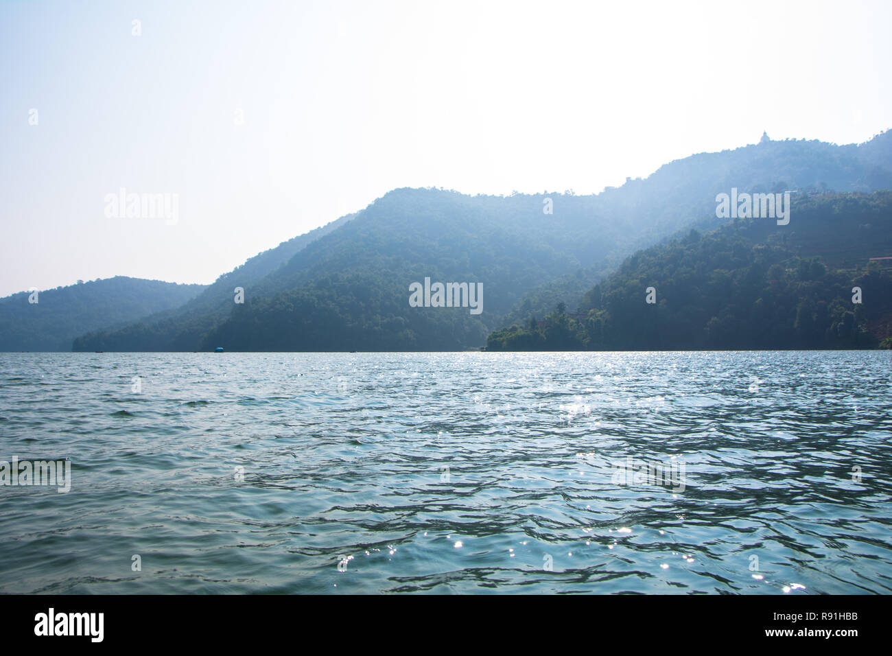 Phewa Lake and hills in Pokhara, a popular tourist destination. Taken ...