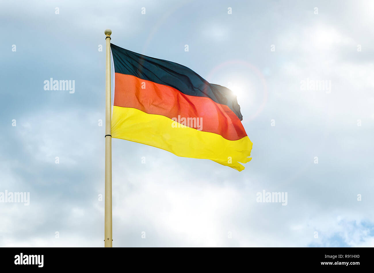 german flag with sun and sky Stock Photo - Alamy