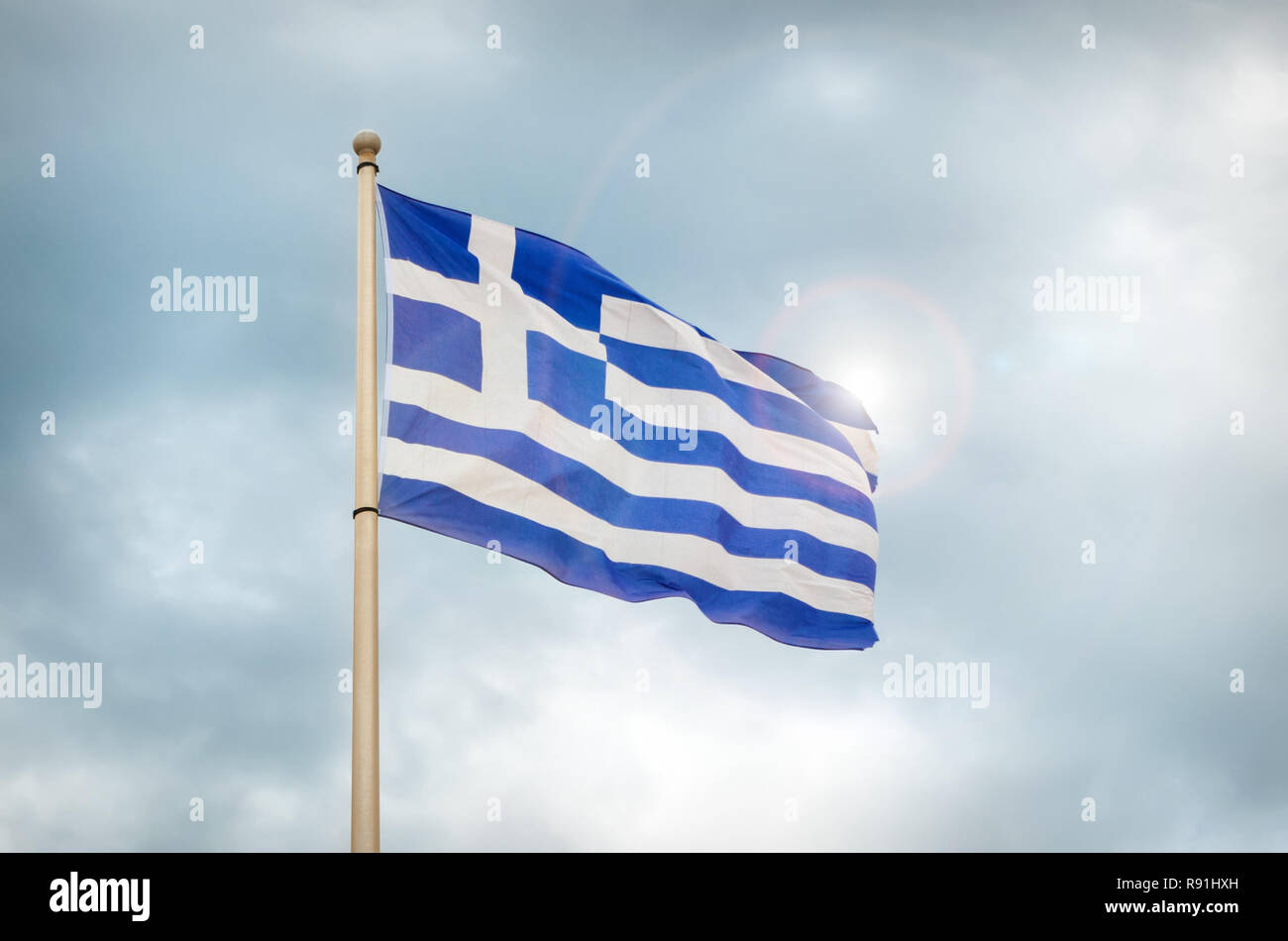greek flag with sun and sky Stock Photo - Alamy