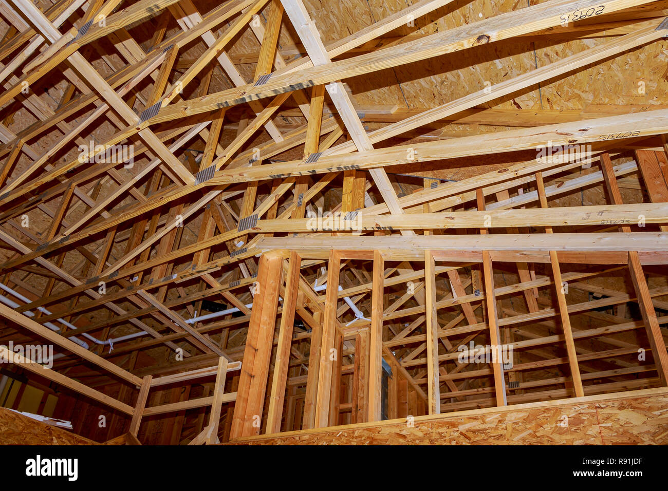 Interior beam frame new house under construction Stock Photo - Alamy