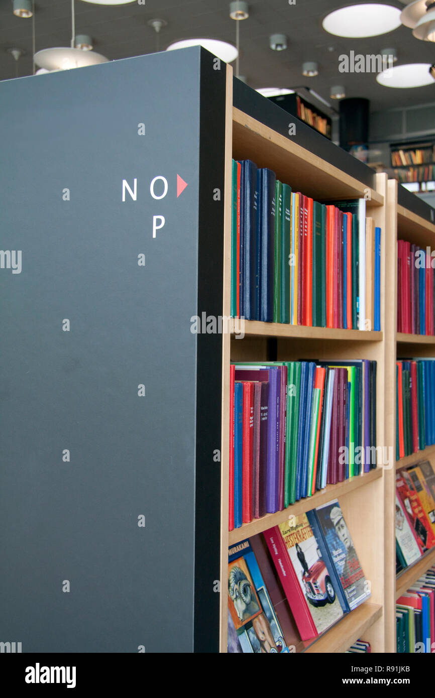 Books on shelves at a public library Stock Photo - Alamy