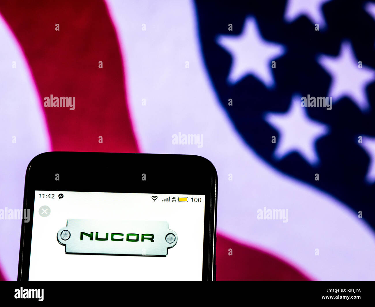 Nucor Steel production company logo seen displayed on smart phone Stock ...