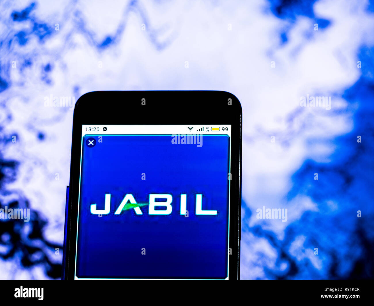 Jabil Company logo seen displayed on smart phone Stock Photo - Alamy