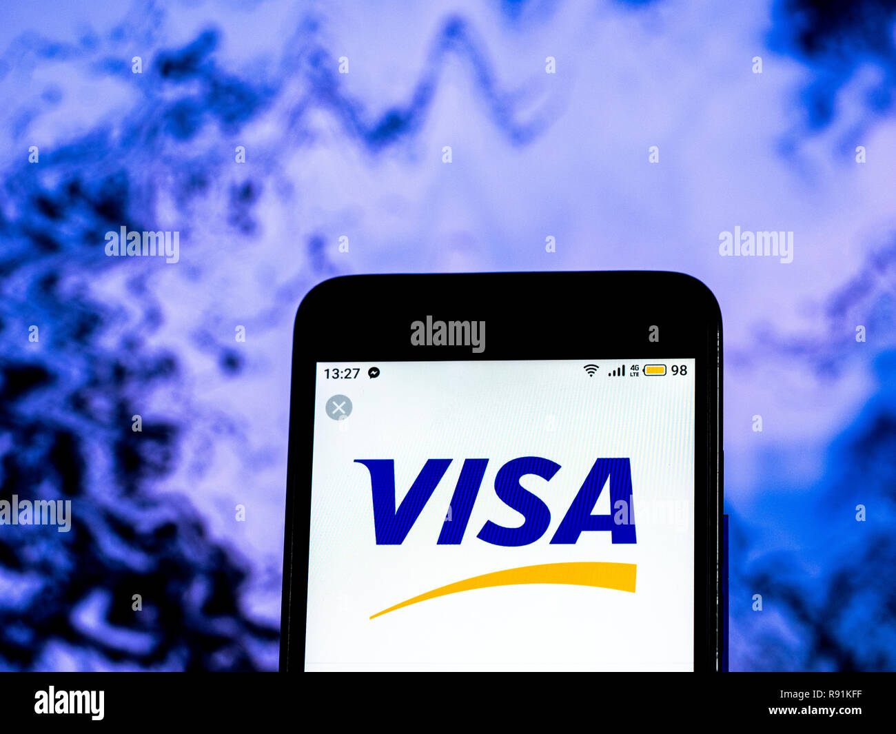 Visa Financial services company logo seen displayed on smart phone ...
