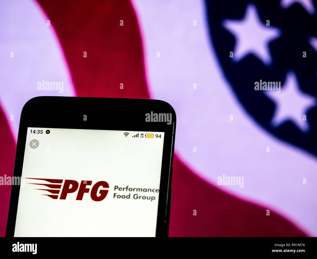 Performance Food Group Company logo seen displayed on smart phone Stock ...