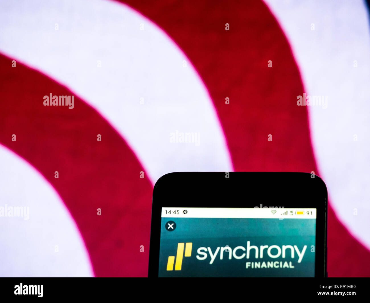 Synchrony Bank logo seen displayed on smart phone Stock Photo - Alamy
