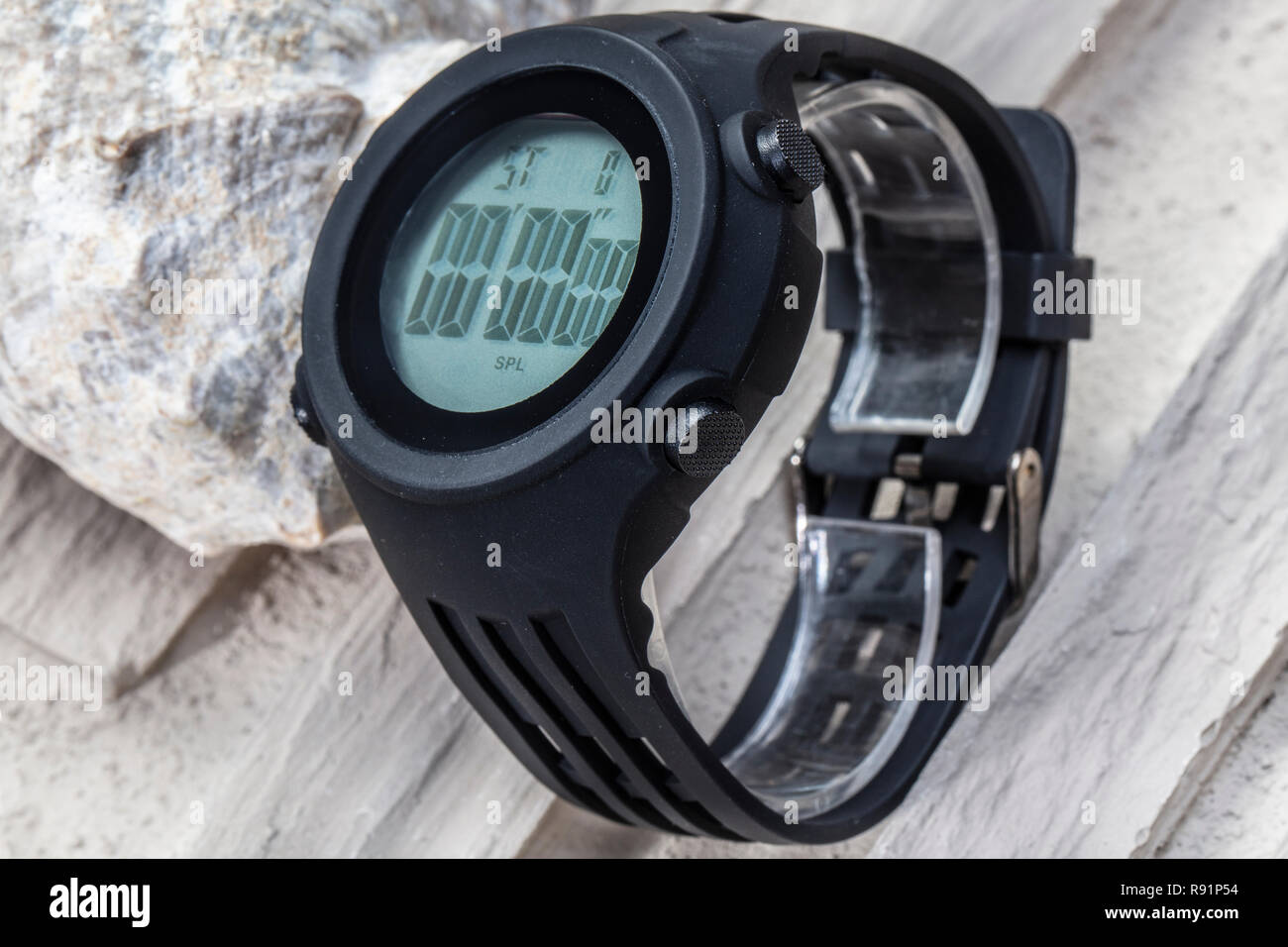 Plastic smart watch with rubber wrist strap with clasp Stock Photo - Alamy