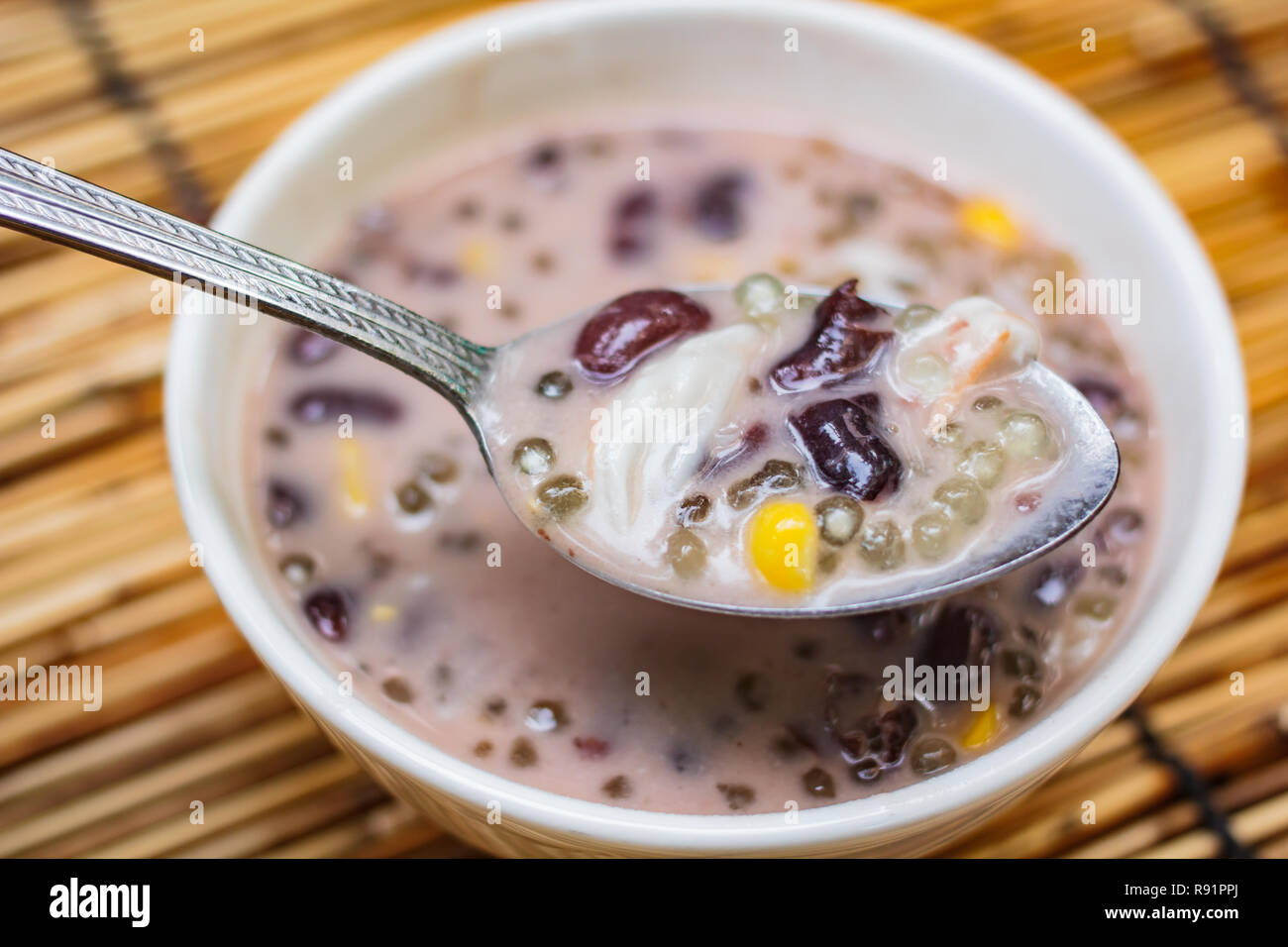 Sago and black beans in coconut cream with young coconut, Thai dessert ...