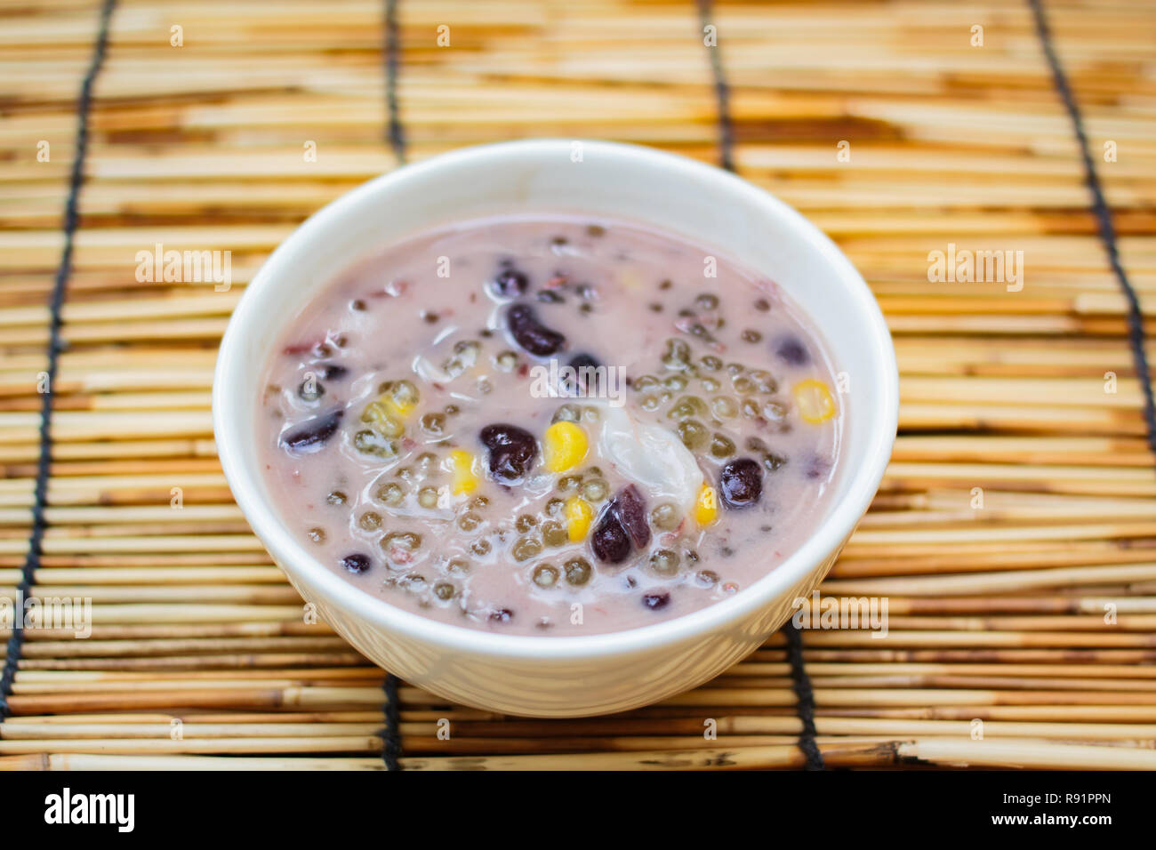 Sago and black beans in coconut cream with young coconut, Thai dessert ...