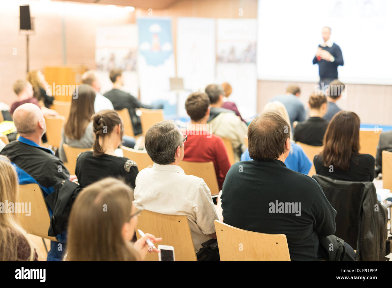 Speaker giving presentation on business conference Stock Photo - Alamy