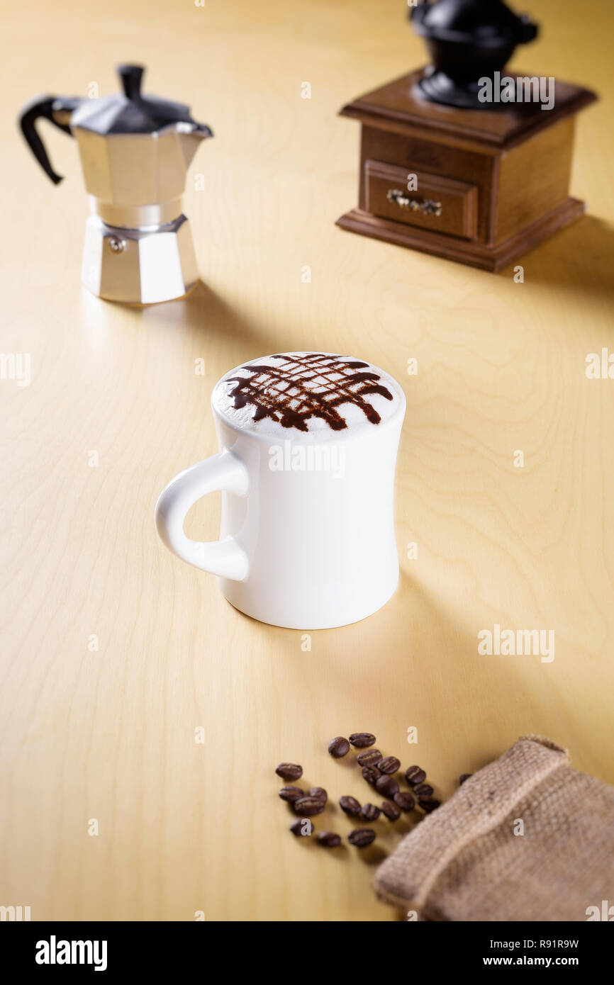 Cappuccino love on glass table hi-res stock photography and images - Alamy