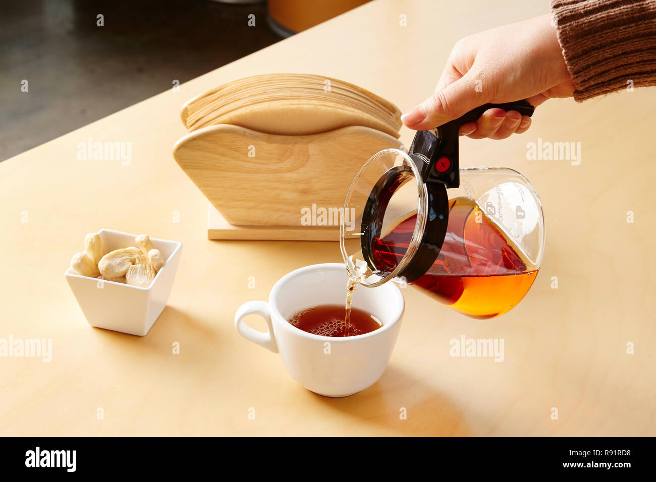Girl pouring liquid hi-res stock photography and images - Alamy