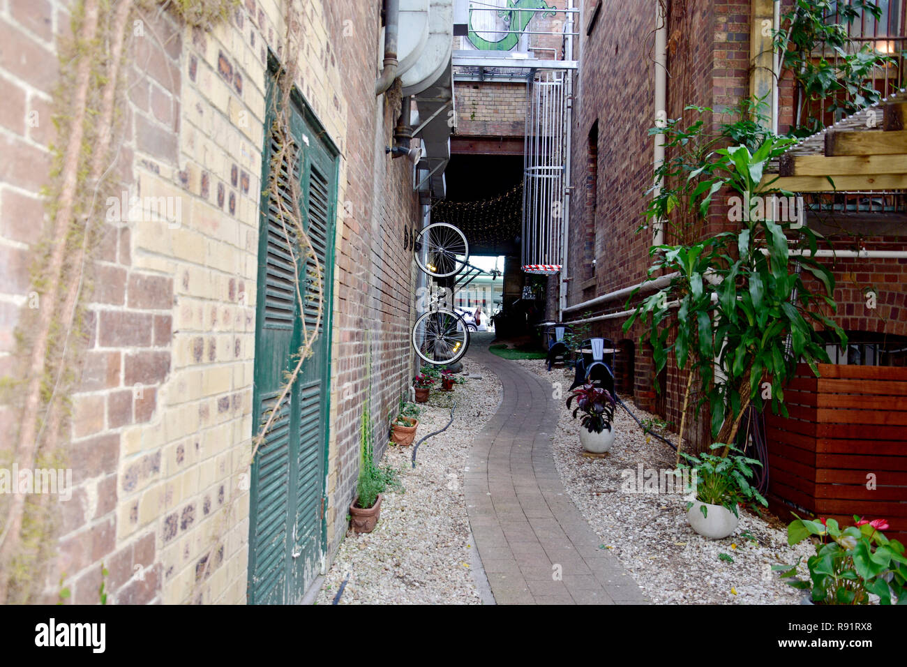 Alley way with bike on wall hi-res stock photography and images - Alamy