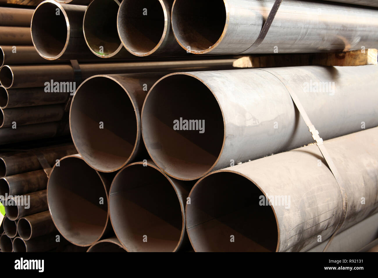 large steel pipes in the factory Stock Photo - Alamy