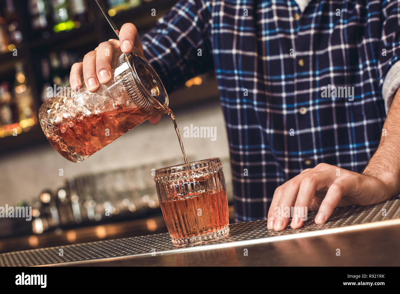 Barman pouring cocktail rum close hi-res stock photography and images ...