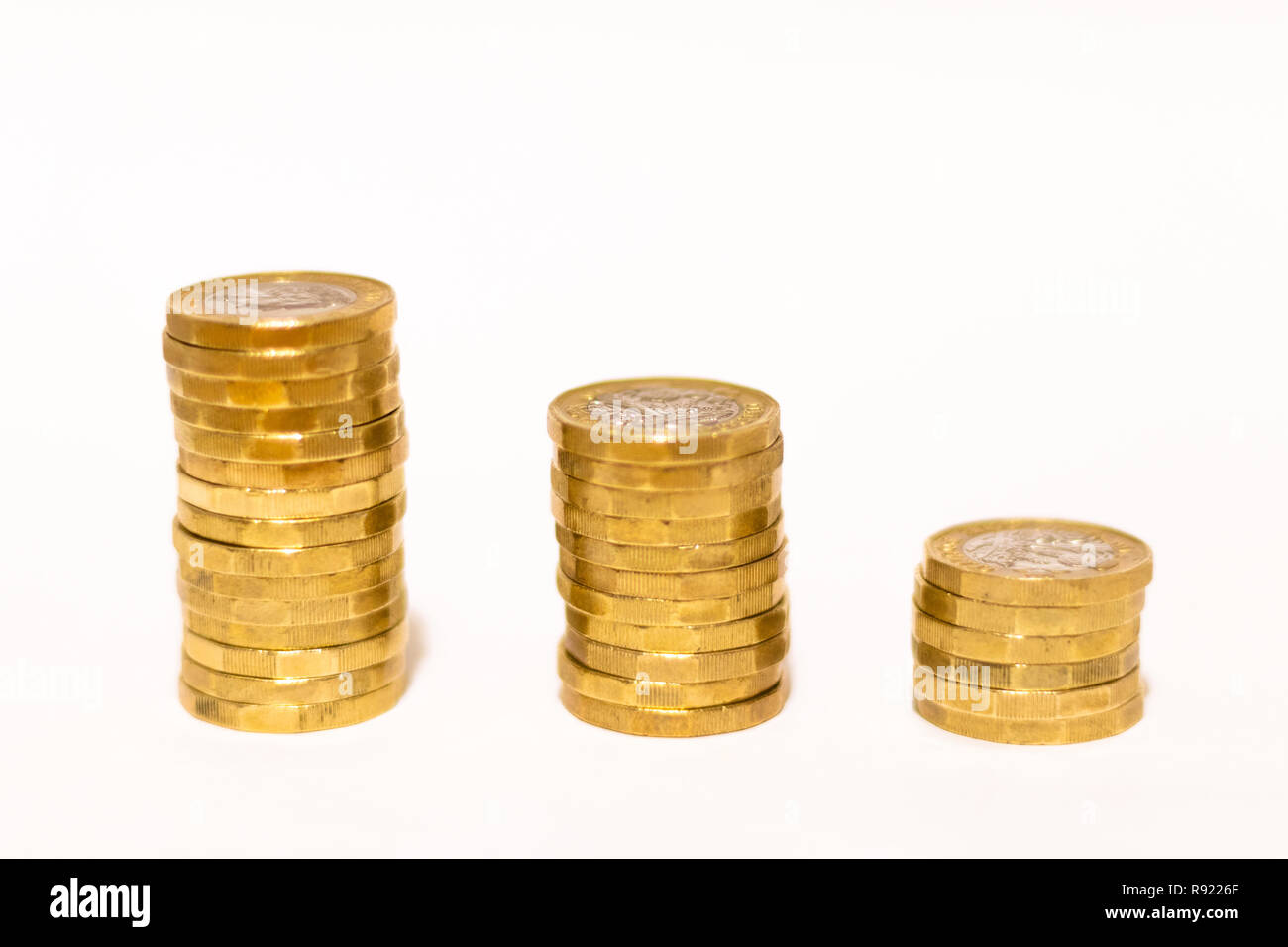 Stacks of new pound coins hi-res stock photography and images - Alamy