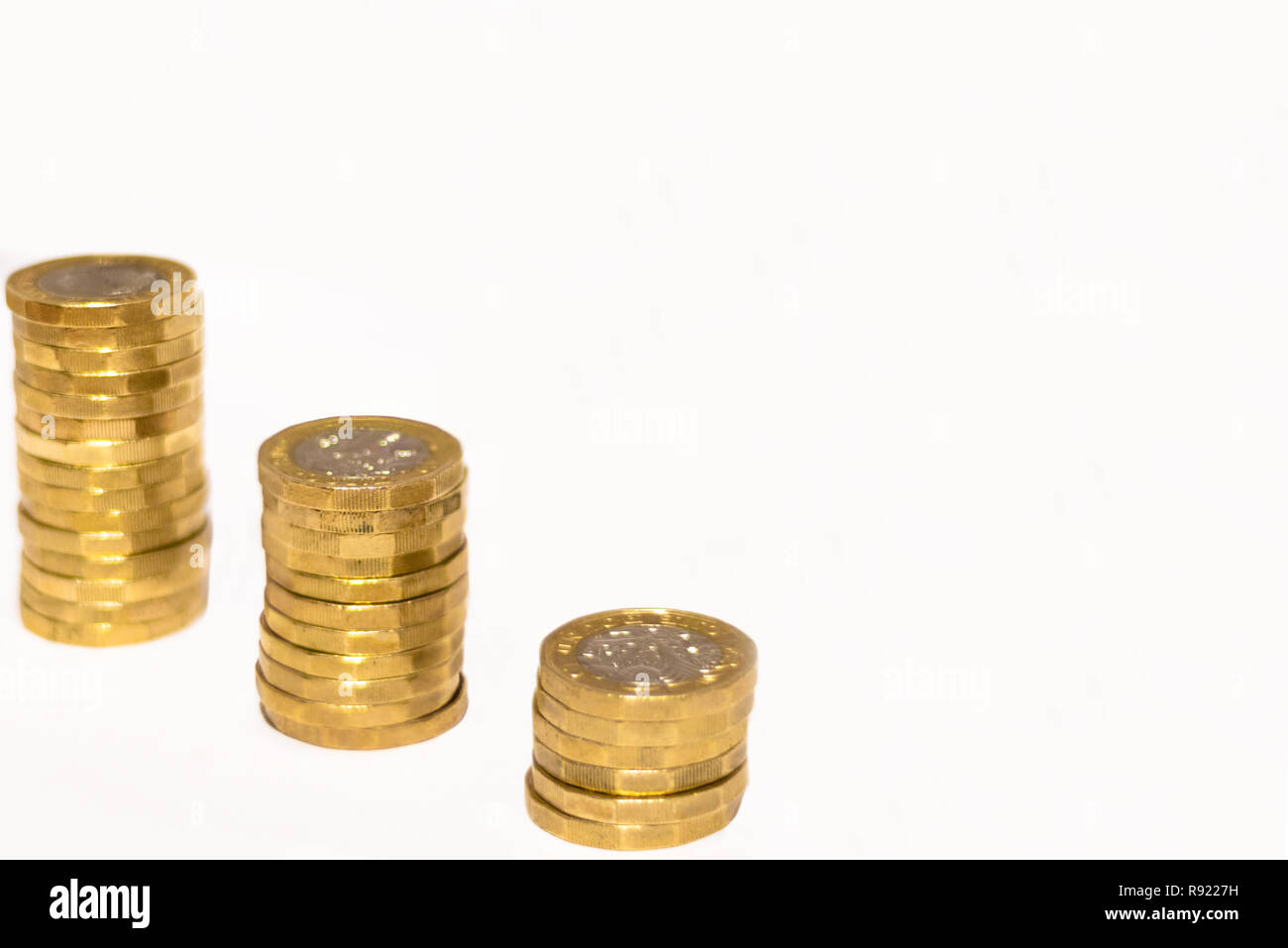 Stacks and Heaps of British GBP Golden Coins Currency Money on white ...