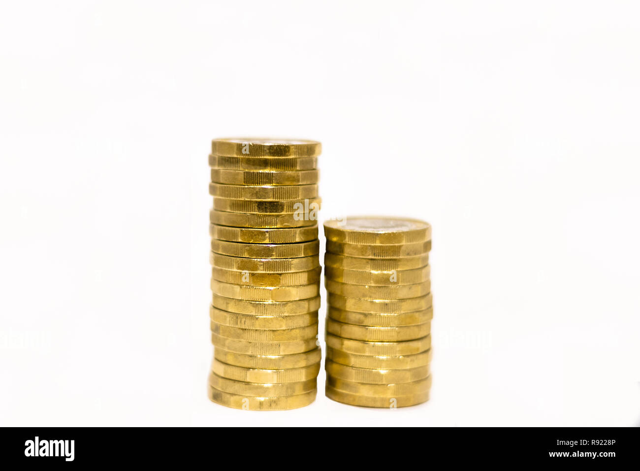 Stacks and Heaps of British GBP Golden Coins Currency Money on white ...