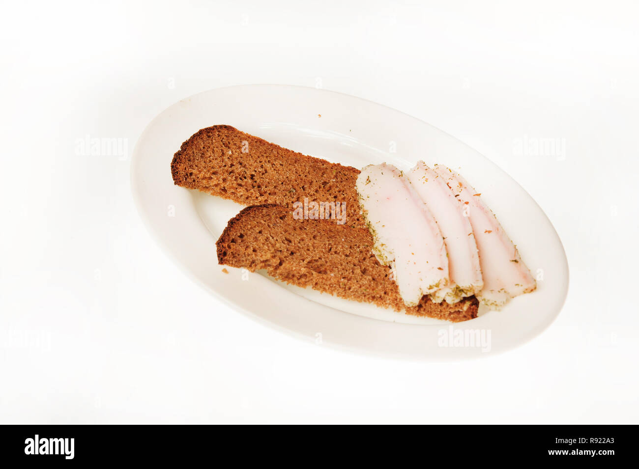 Studio shot of black bread and salo, isolated on white background Stock ...