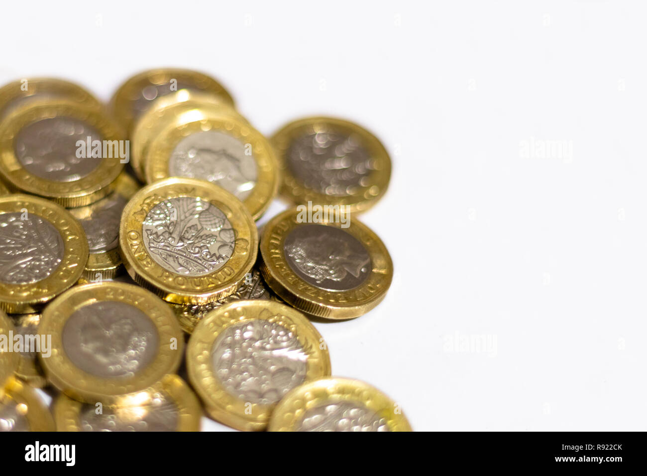 Stacks and Heaps of British GBP Golden Coins Currency Money on white ...