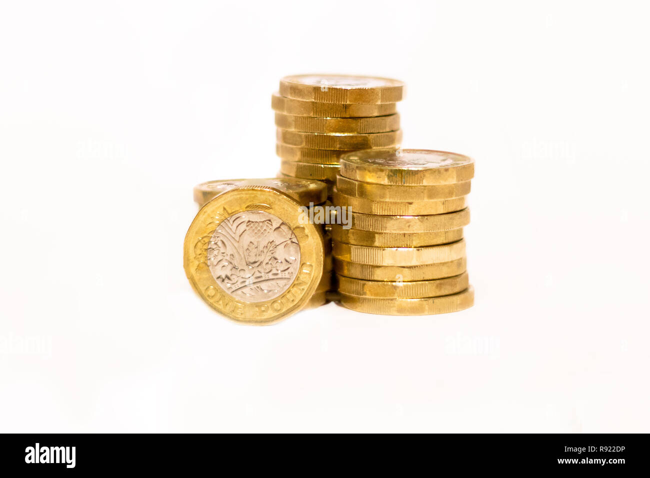 Stacks and Heaps of British GBP Golden Coins Currency Money on white ...