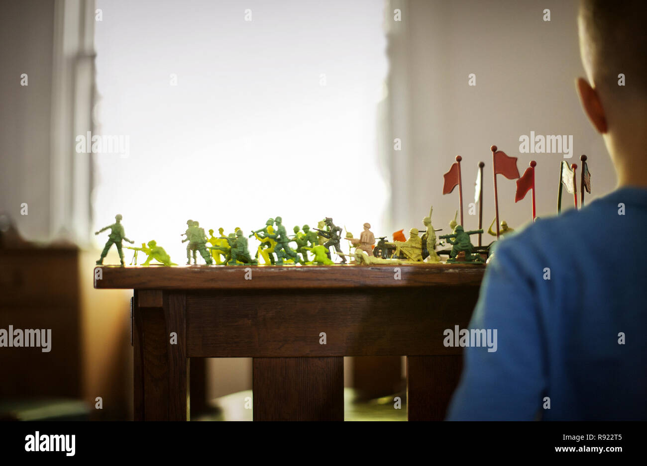 Army soldier toys set up on a table Stock Photo - Alamy