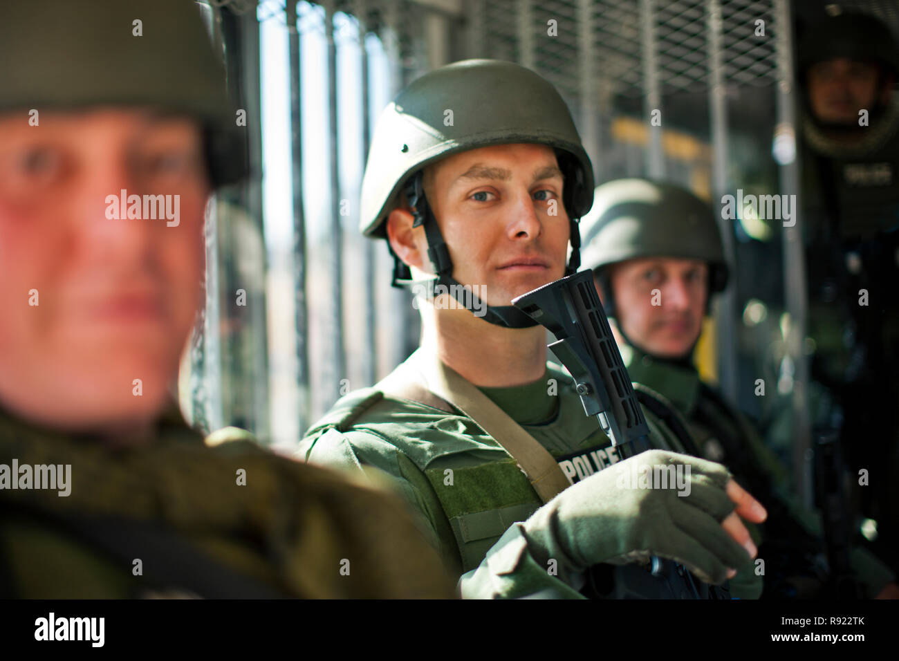 Portrait of three police officers at a training facility Stock Photo ...