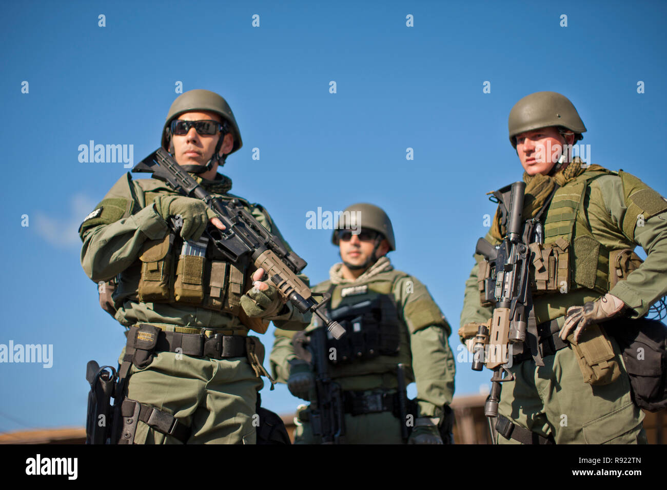 Three police officers at a training facility Stock Photo - Alamy