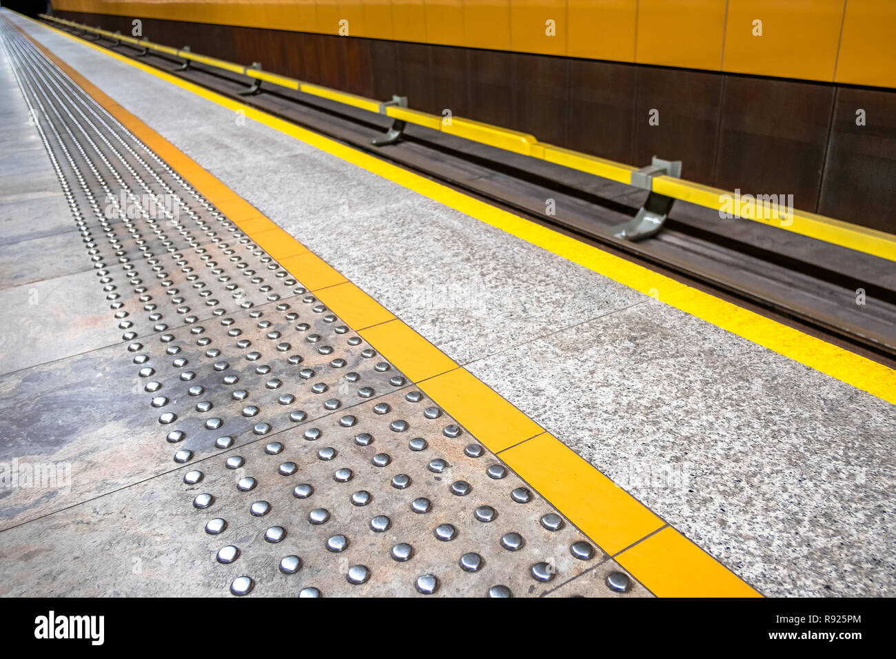 diagonal tactile paving at platform edge also called detectable warning ...