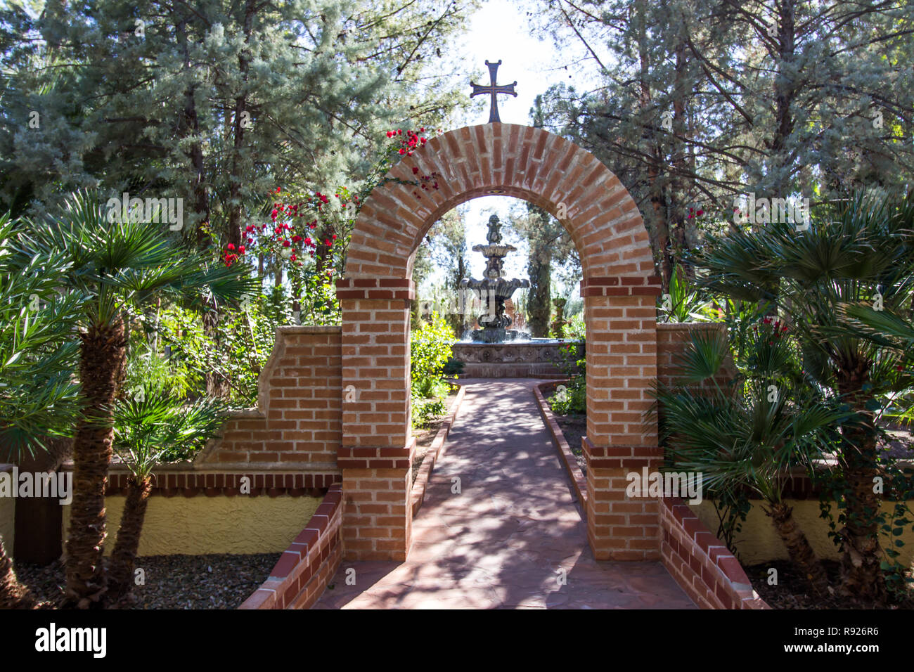 Brick Archway Leading To Outdoor Fountain In Monastery Garden Stock ...