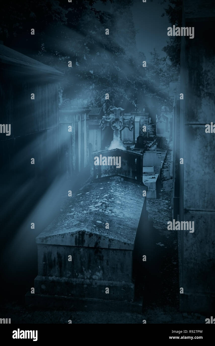 Old european cemetery grave in a foggy night Stock Photo - Alamy