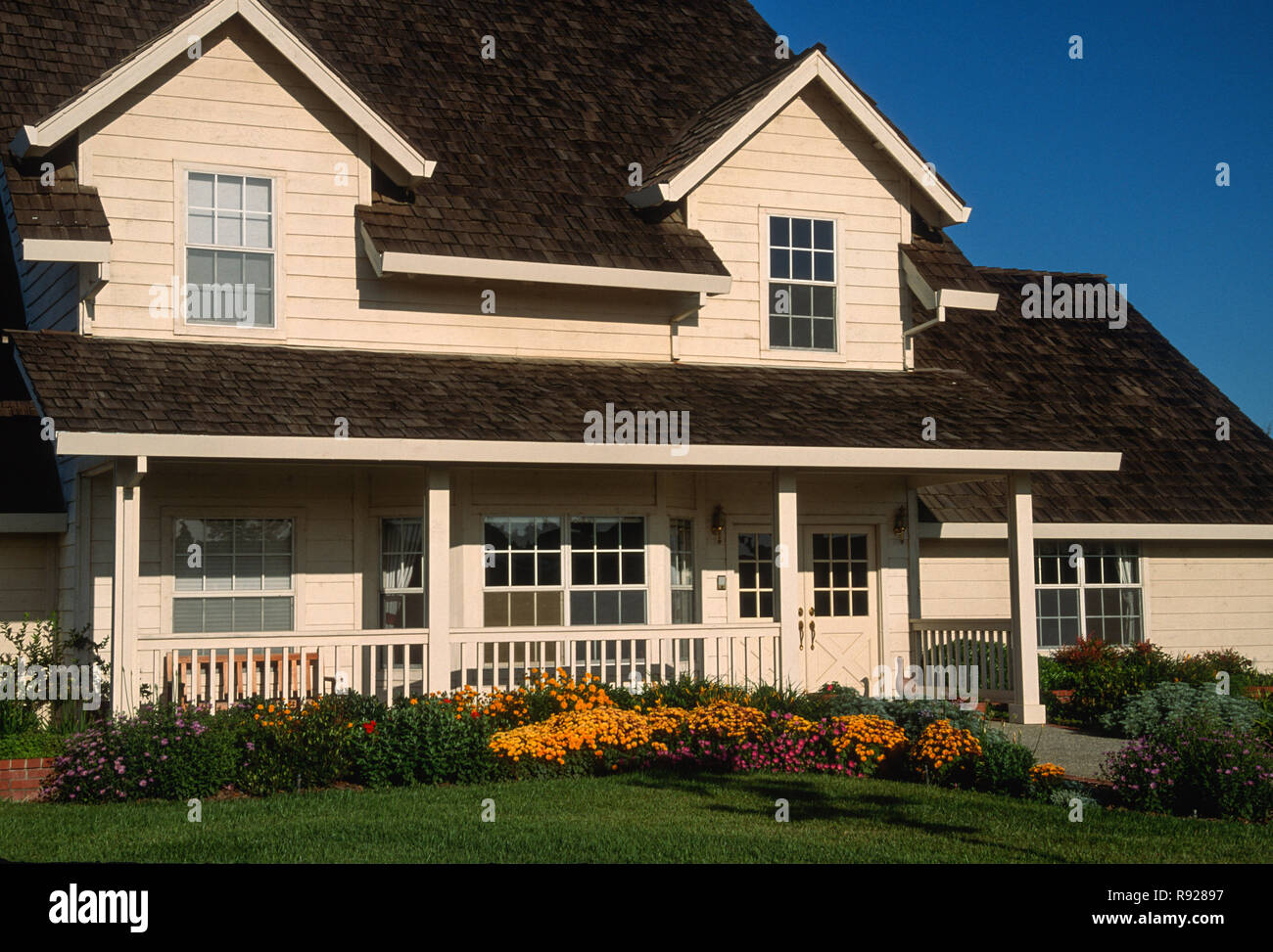 Large suburban home has welcoming front porch, Davis, California, USA ...