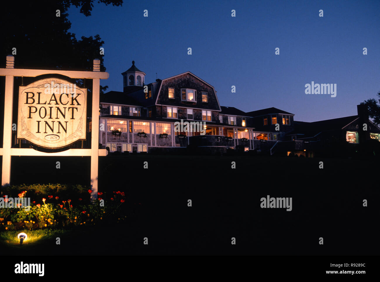The Black Point Inn is inviting at night, Maine Stock Photo - Alamy