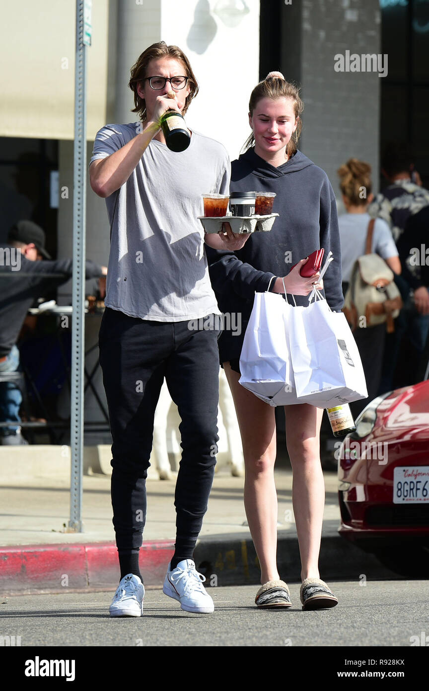 Ireland Baldwin cannot stop smiling as she and Corey Harper pick up lunch in Los Angeles ...