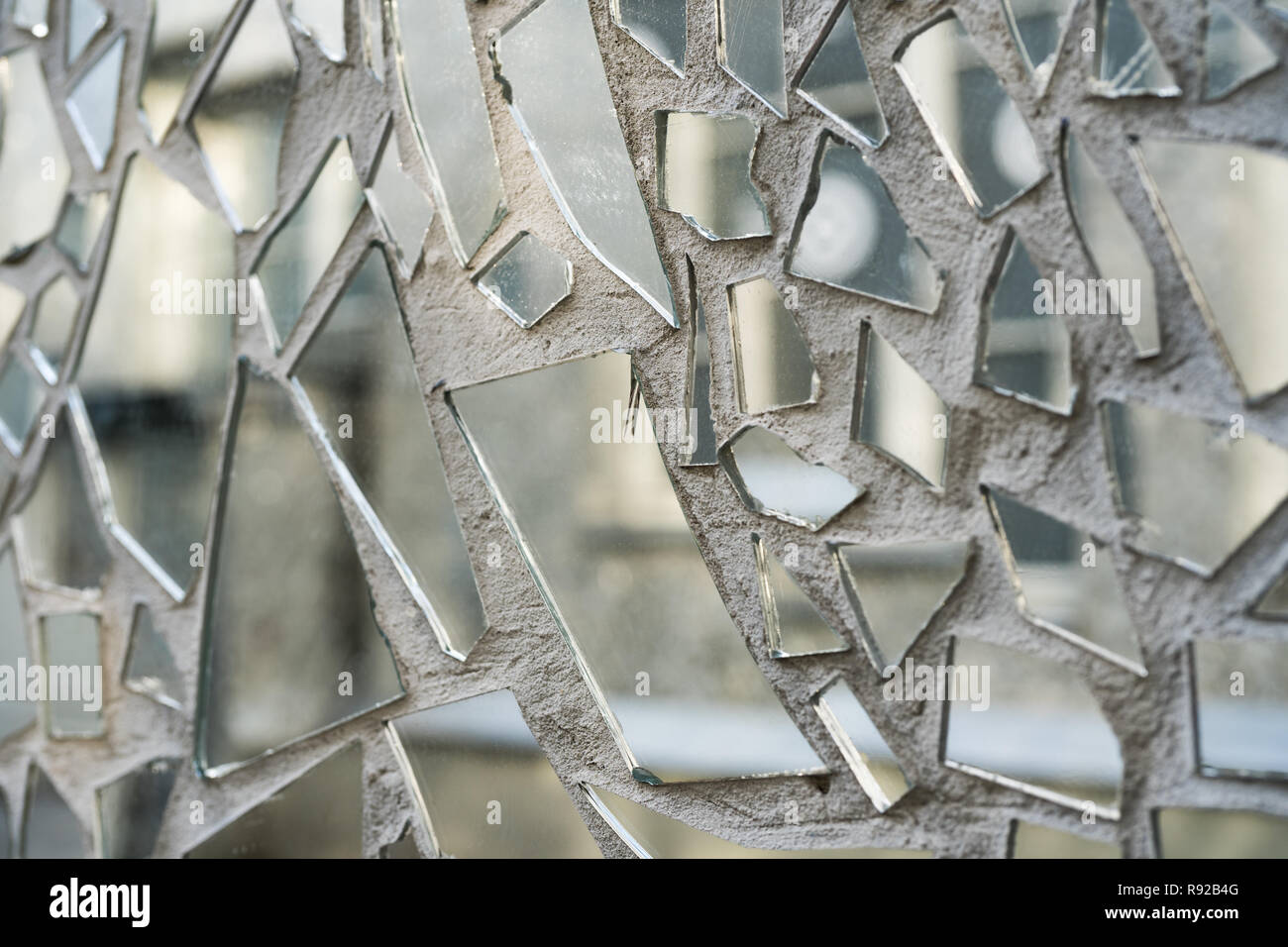 Shards of a mirror glass pattern on a wall Stock Photo - Alamy