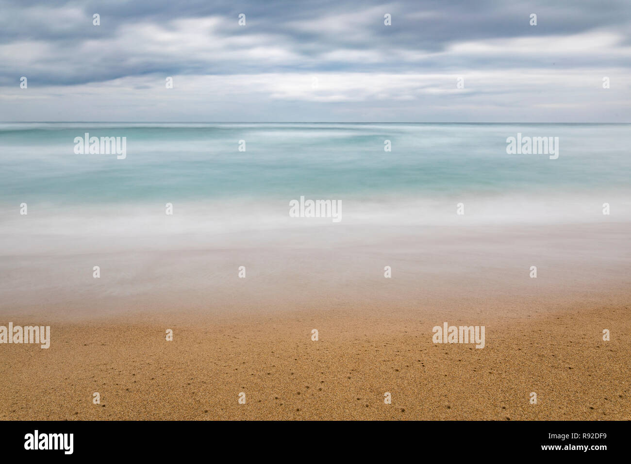 Natural color layers of the cloudy sky, sea and sand, grey, turquoise ...
