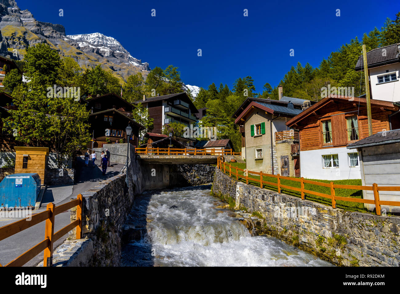 River and chalet in swiss village in Alps, Leukerbad, Leuk, Visp ...