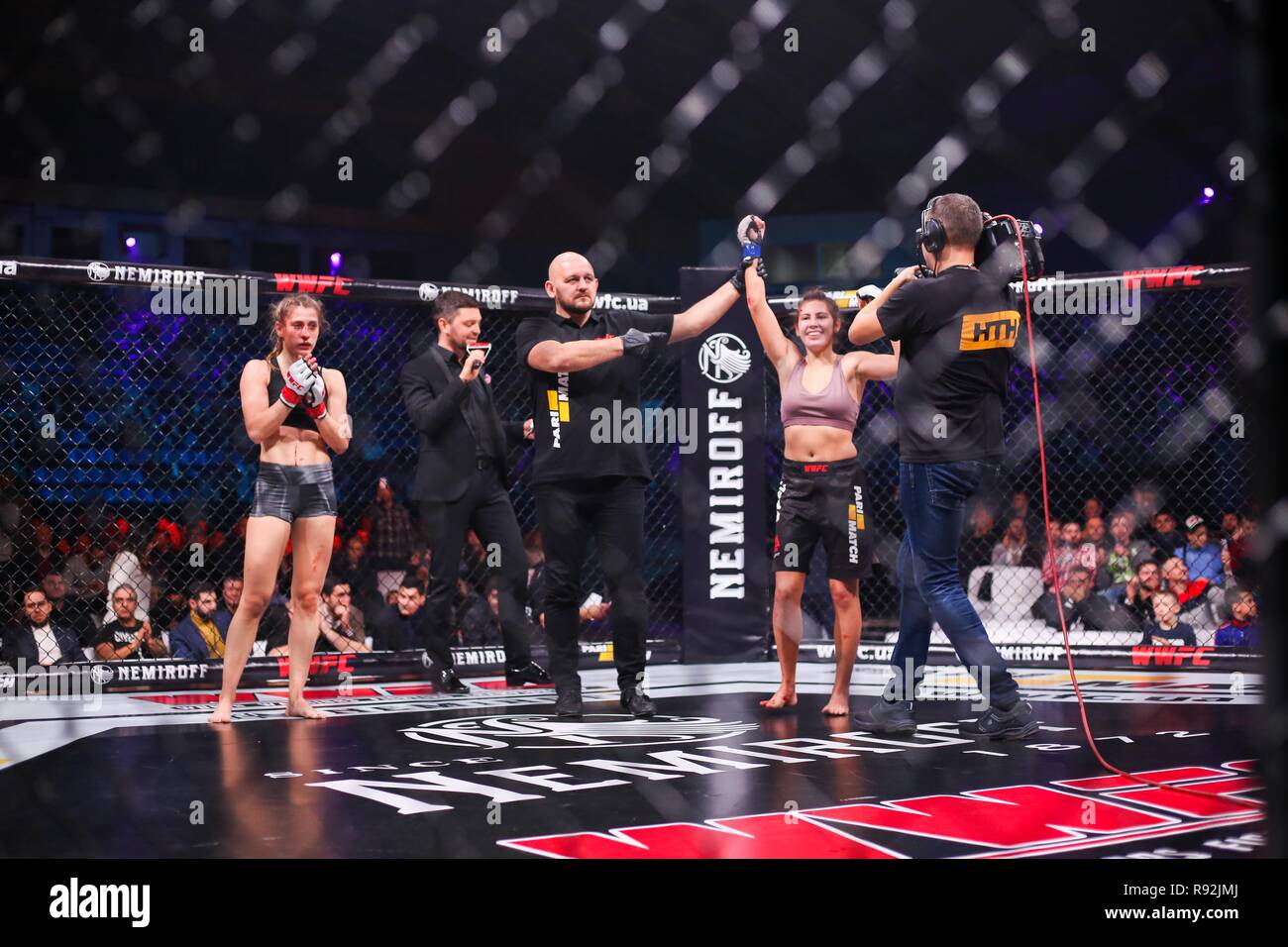 Judge is rising up the hand of the winner, Alisa Danyuk from Ukraine ...