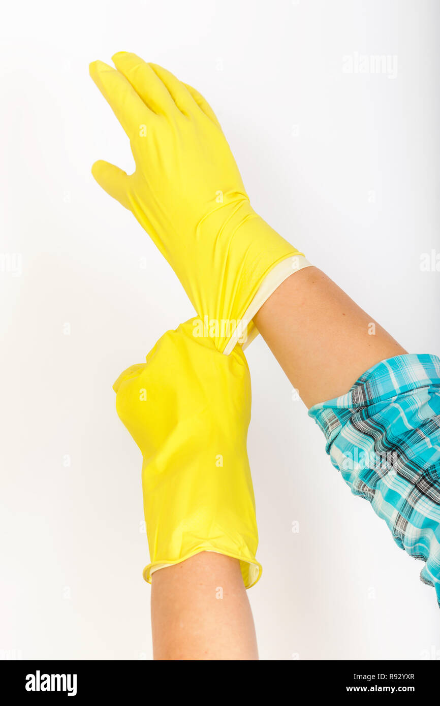 woman housekeeper wear yellow rubber gloves on white background Stock ...