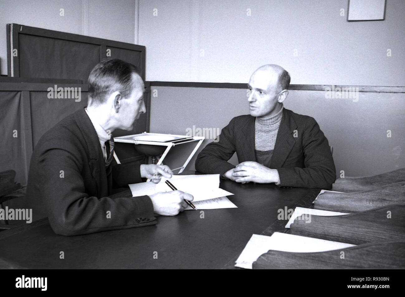 1940s, historical, a former mine worker having a job interview Stock ...