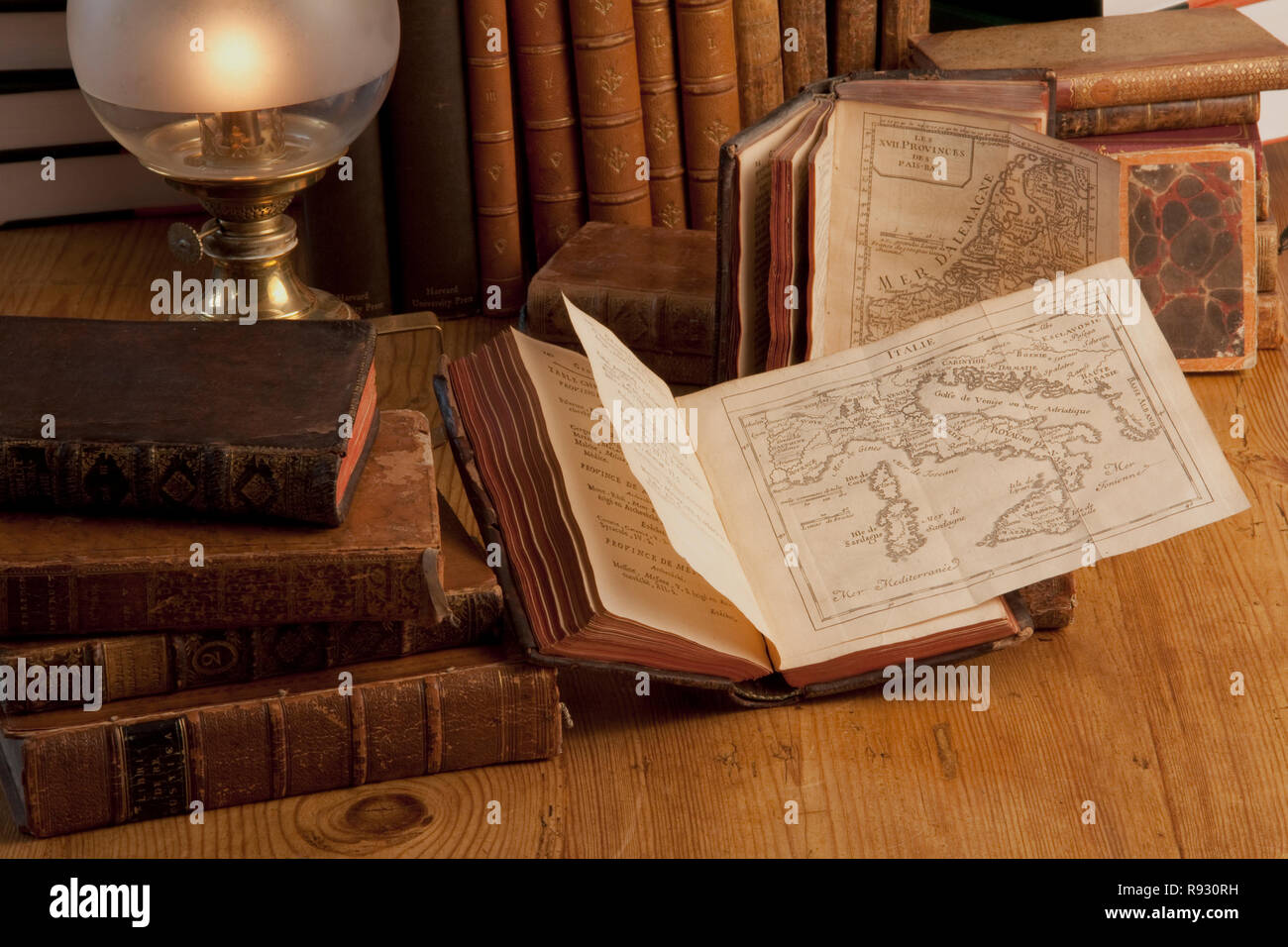 Old antique vintage books with maps of Italy and Europe Stock Photo - Alamy